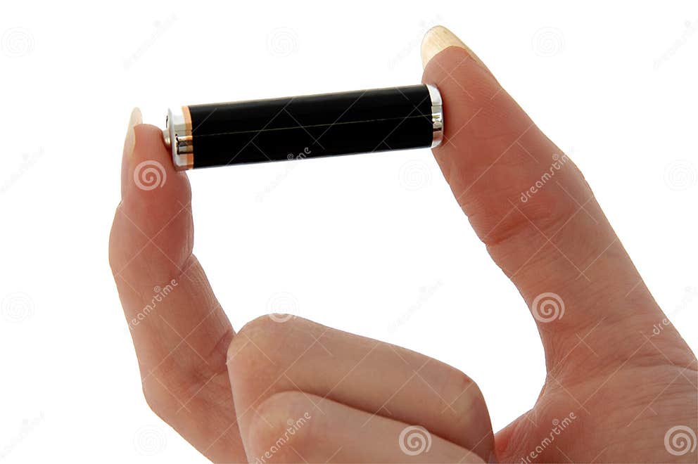 Battery - Small AAA Battery, Held between Fingers Stock Photo - Image ...