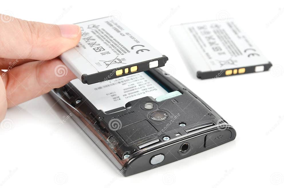 Battery and smart phone stock photo. Image of electricity - 26070568