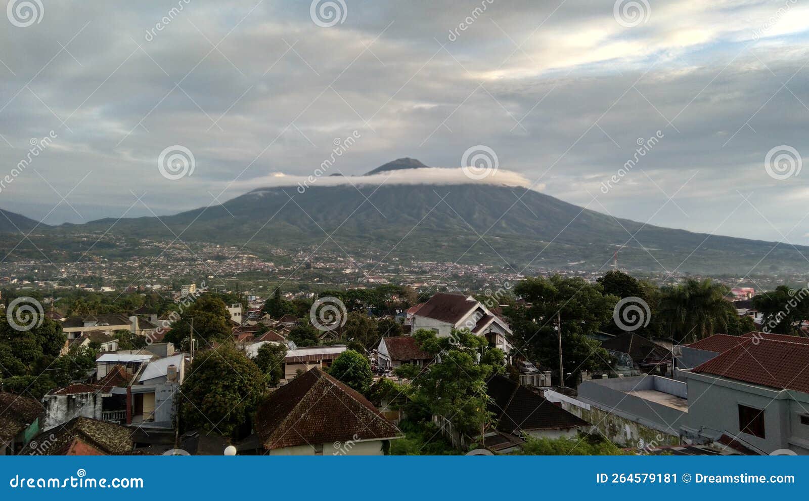 Batu City and Mount Arjuna stock image. Image of tree - 264579181