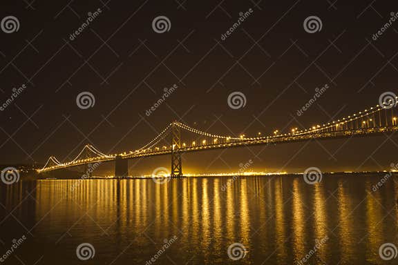 Bay Bridge at night stock photo. Image of infrastructure - 19559400