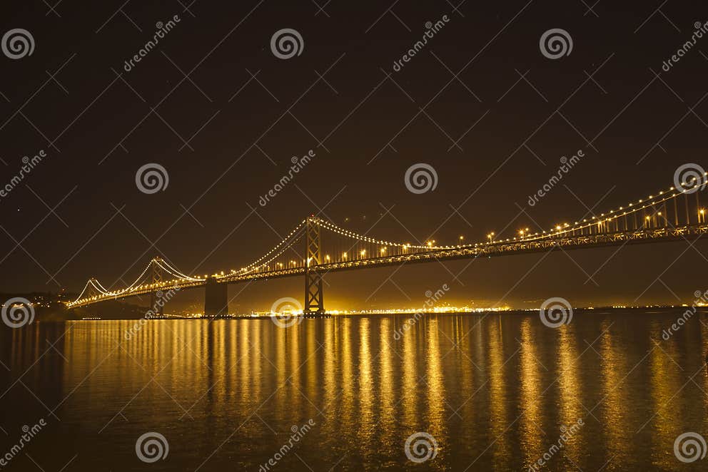 Bay Bridge at night stock photo. Image of infrastructure - 19559400