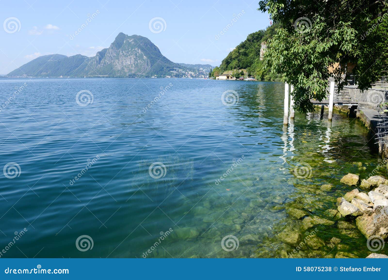 The bay of lake Lugano stock photo. Image of scenery - 58075238