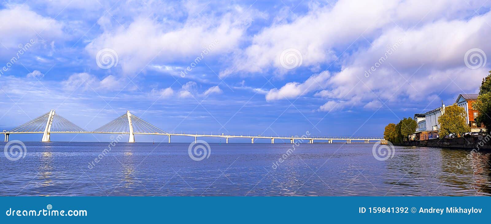 Bay in the Rays of the Rising Sun. Bridge and Cityscape Stock Photo ...