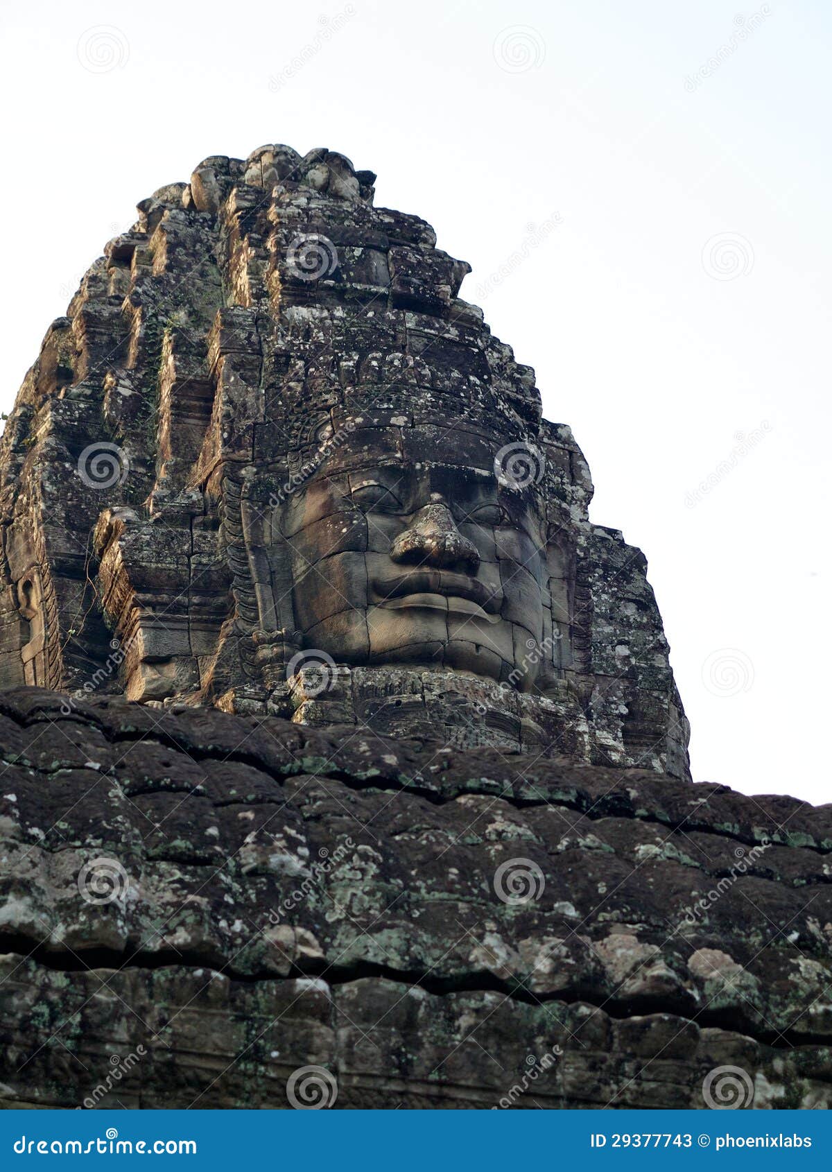 Bayon faces in Angkor stock image. Image of buddha, asia - 29377743