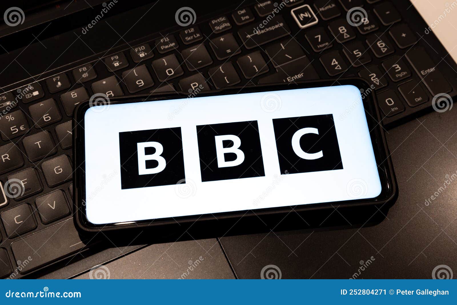 BBC Logo on Smartphone Screen , Background is a Keyboard , Sydney ...