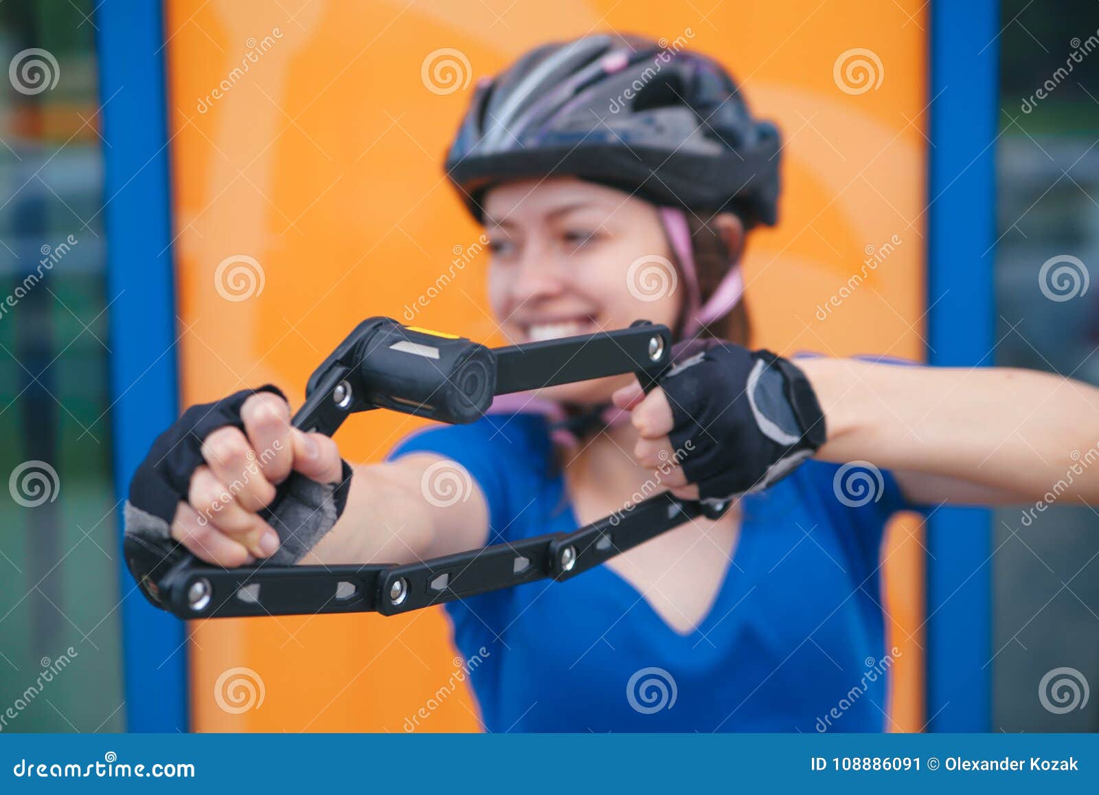 Bicycle Lock. Bicycle Lock in the Hands of the Girl Stock Image - Image ...