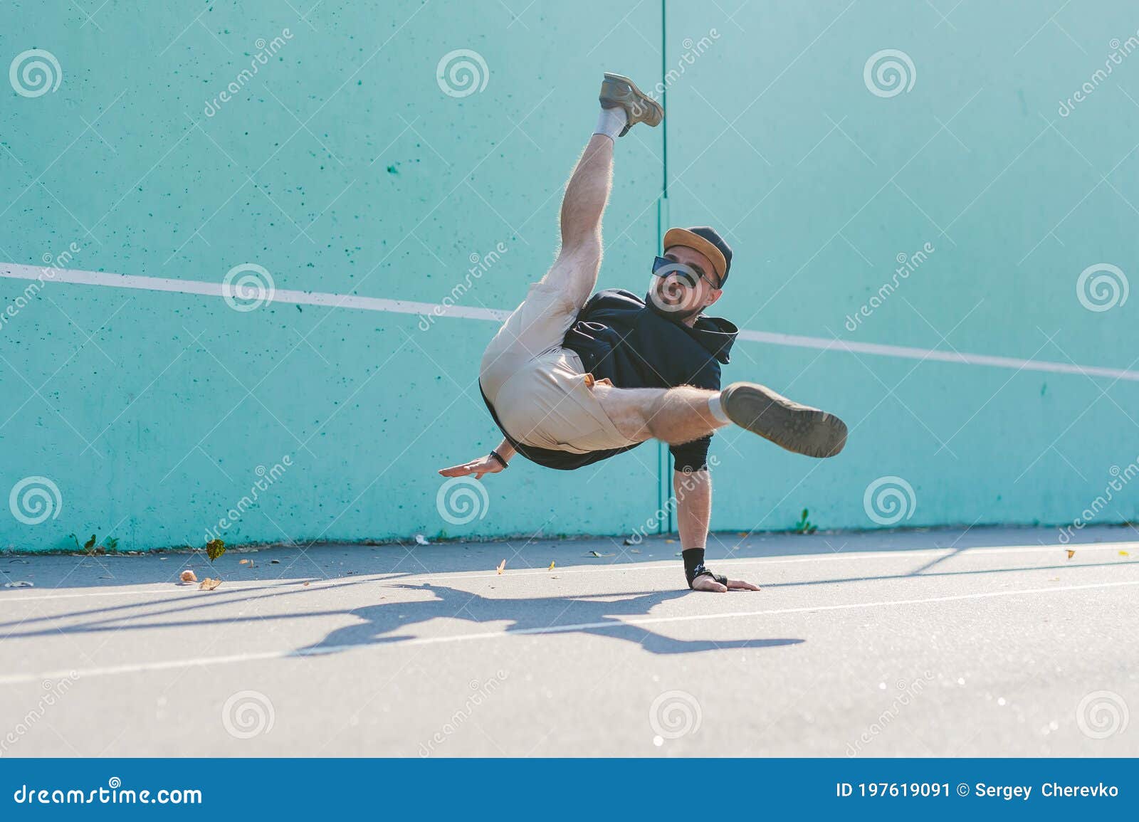BBOY Dancing Breakdance Against a Blue Wall Stock Image - Image of jump ...