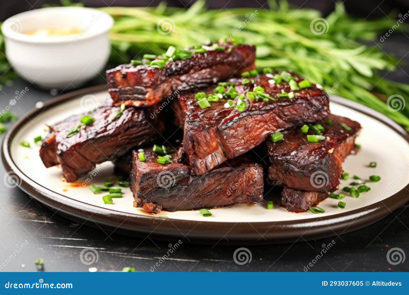 Bbq Beef Ribs Garnished with Fresh Chives on Plate Stock Image - Image ...