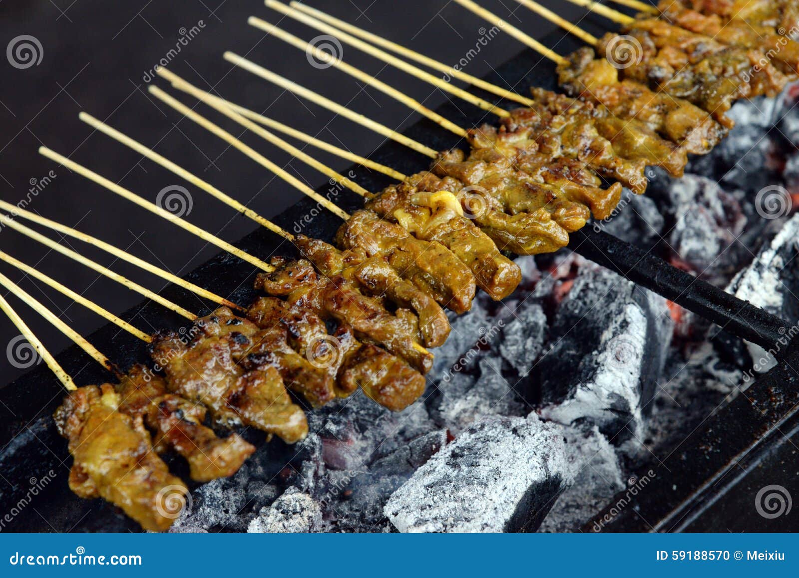 BBQ Beef Satay on Grill stock photo. Image of flames - 59188570