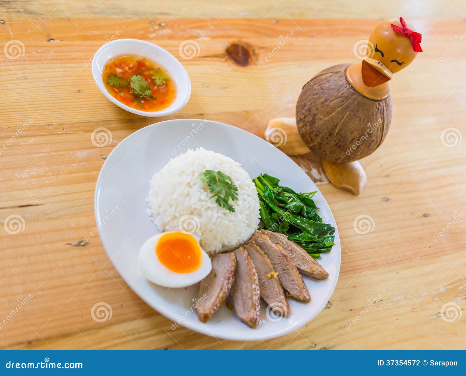 BBQ duck over steamed rice stock photo. Image of barbecue - 37354572