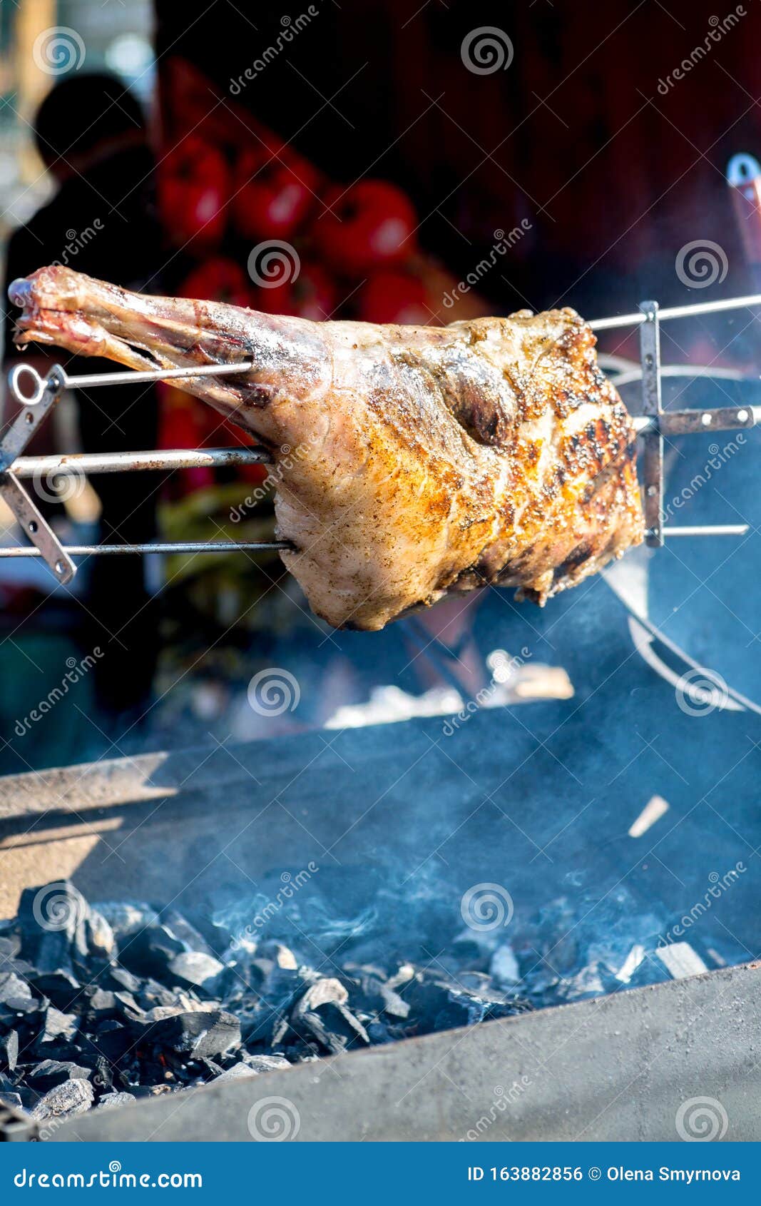 BBQ meat roast on a spit stock photo. Image of cuisine - 163882856