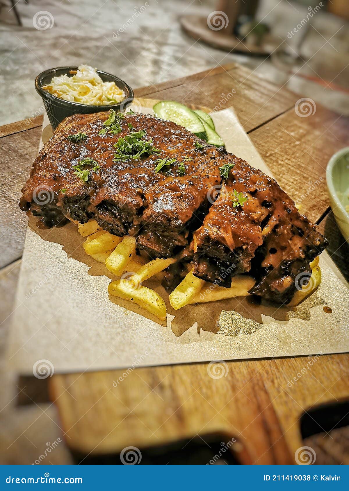 Bbq pork ribs with fries stock photo. Image of fries - 211419038