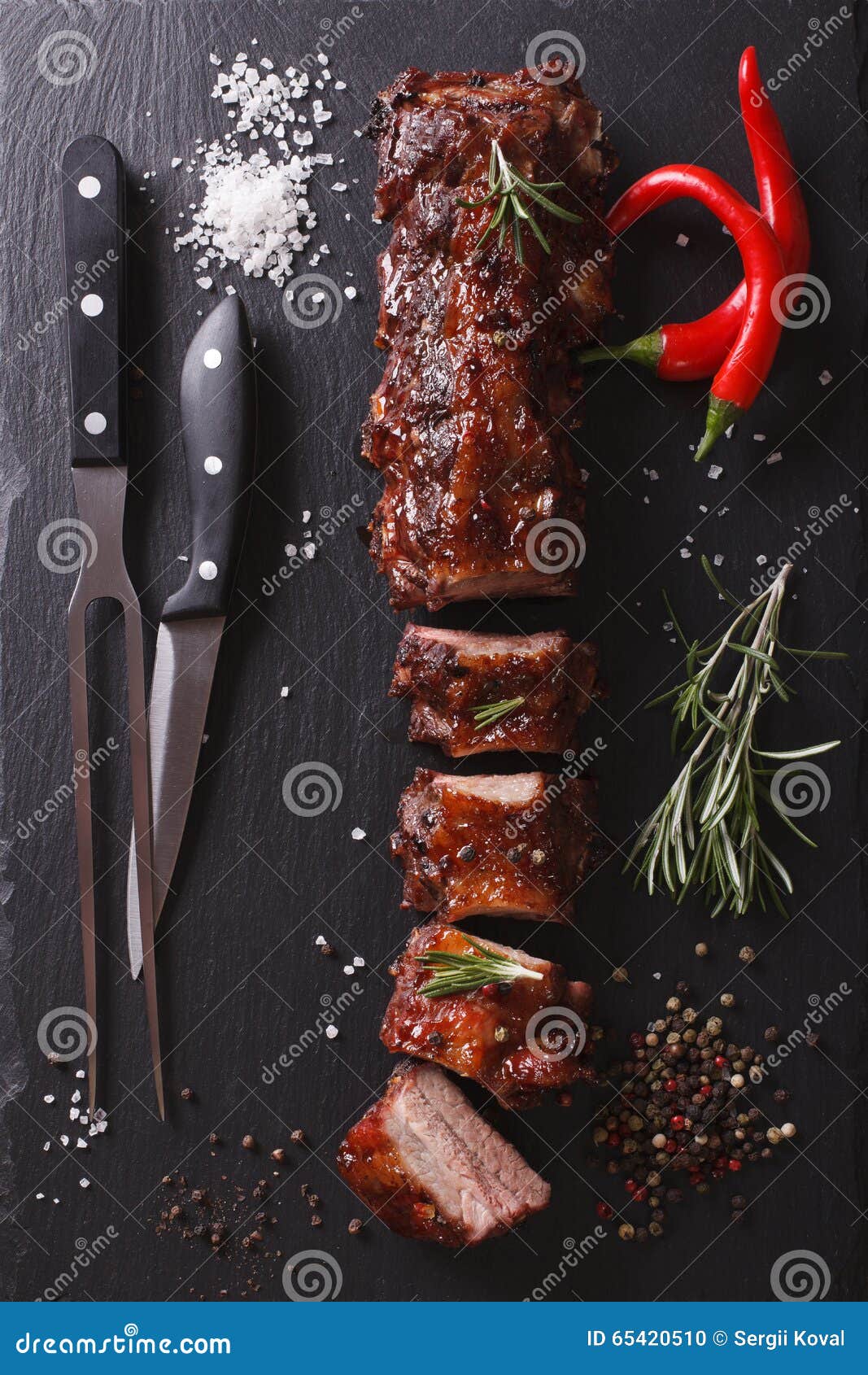 BBQ Pork Ribs on a Table. Vertical Top View Stock Photo - Image of ...