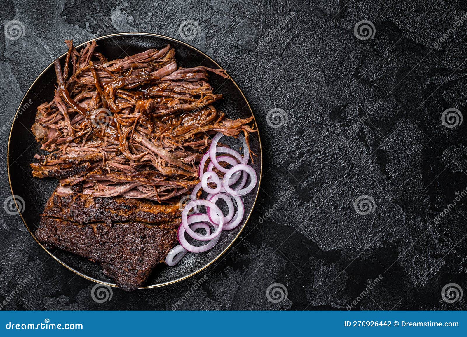 BBQ Pulled Pork Meat on Plate. Black Background. Top View Stock Photo ...