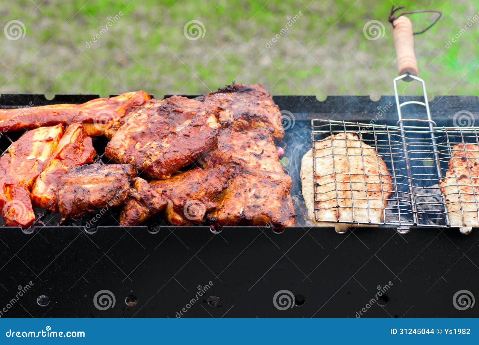BBQ Ribs and Fish on Grill with Charcoal Stock Photo - Image of ...