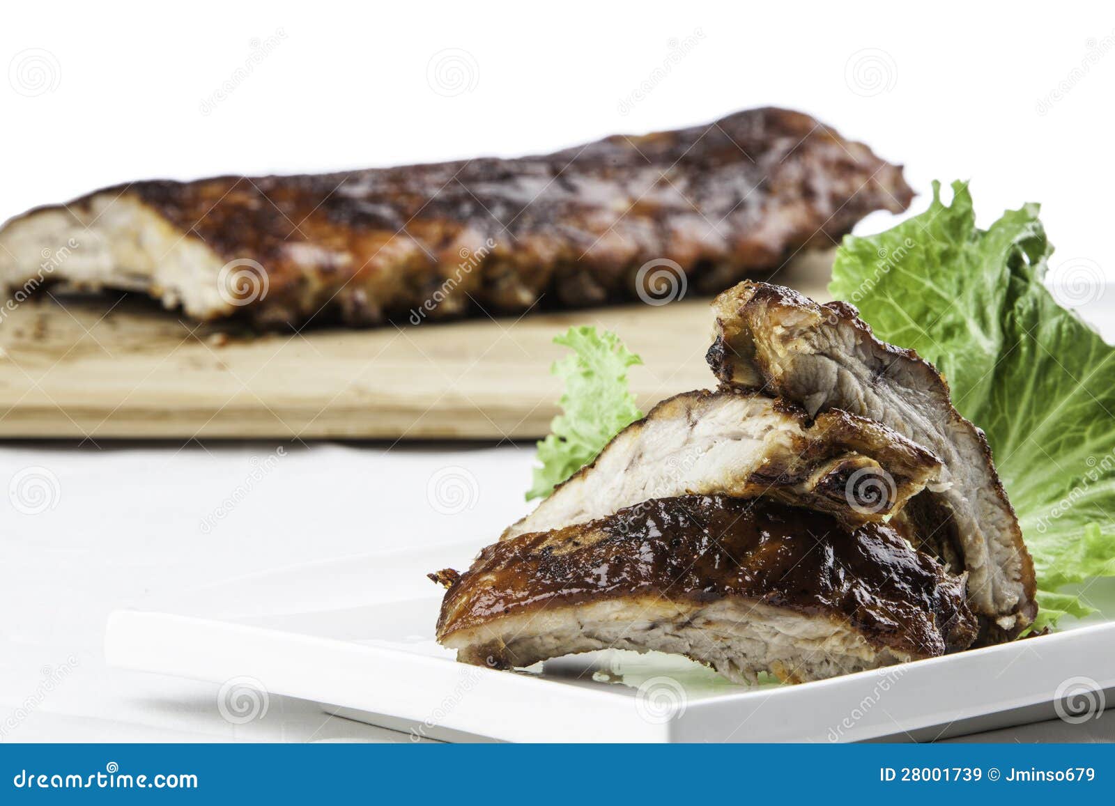 BBQ Ribs Plated on Lettuce stock image. Image of culinary - 28001739
