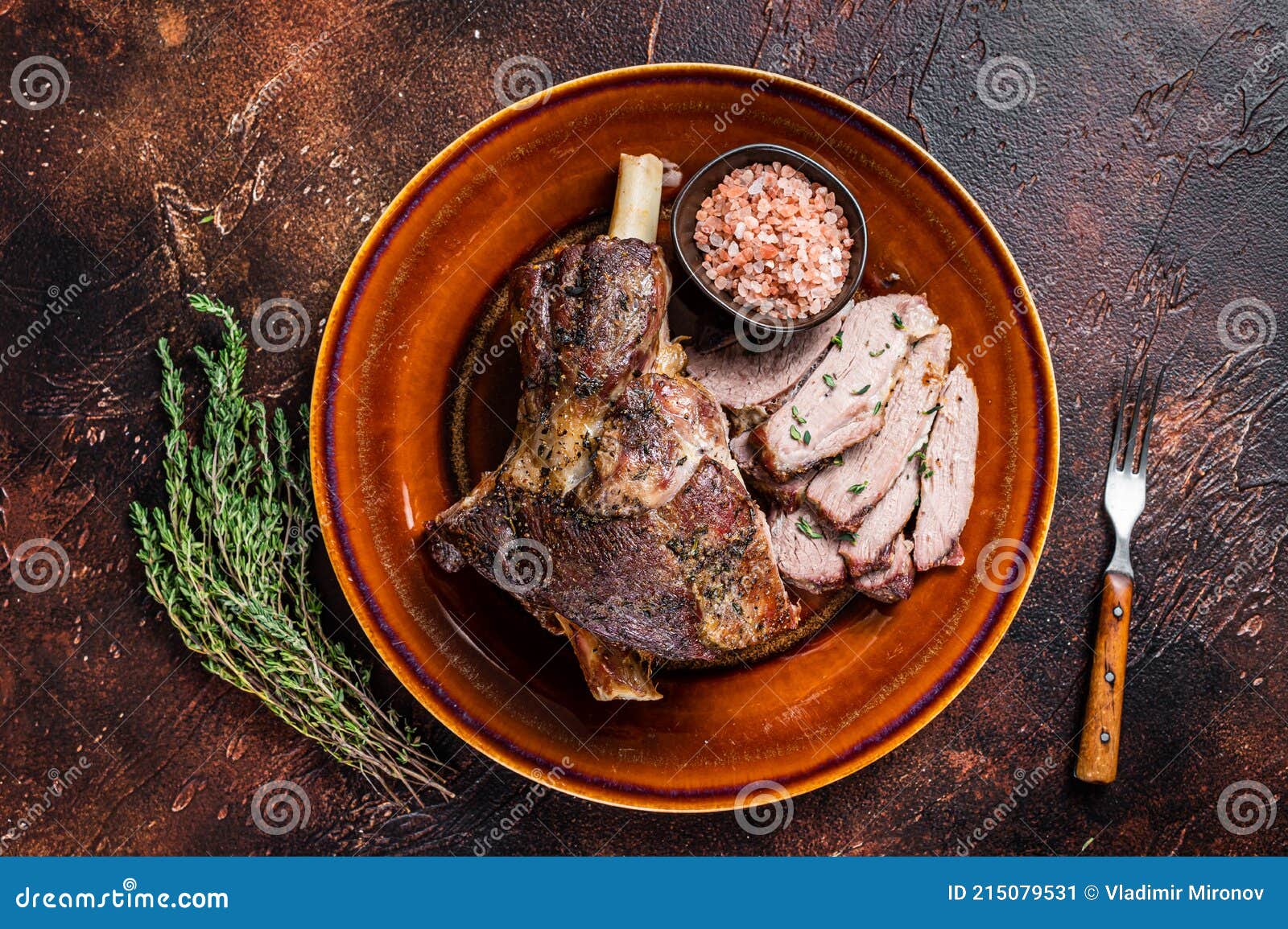 BBQ Roast Lamb Mutton Leg Sliced on a Rustic Plate. Dark Background ...