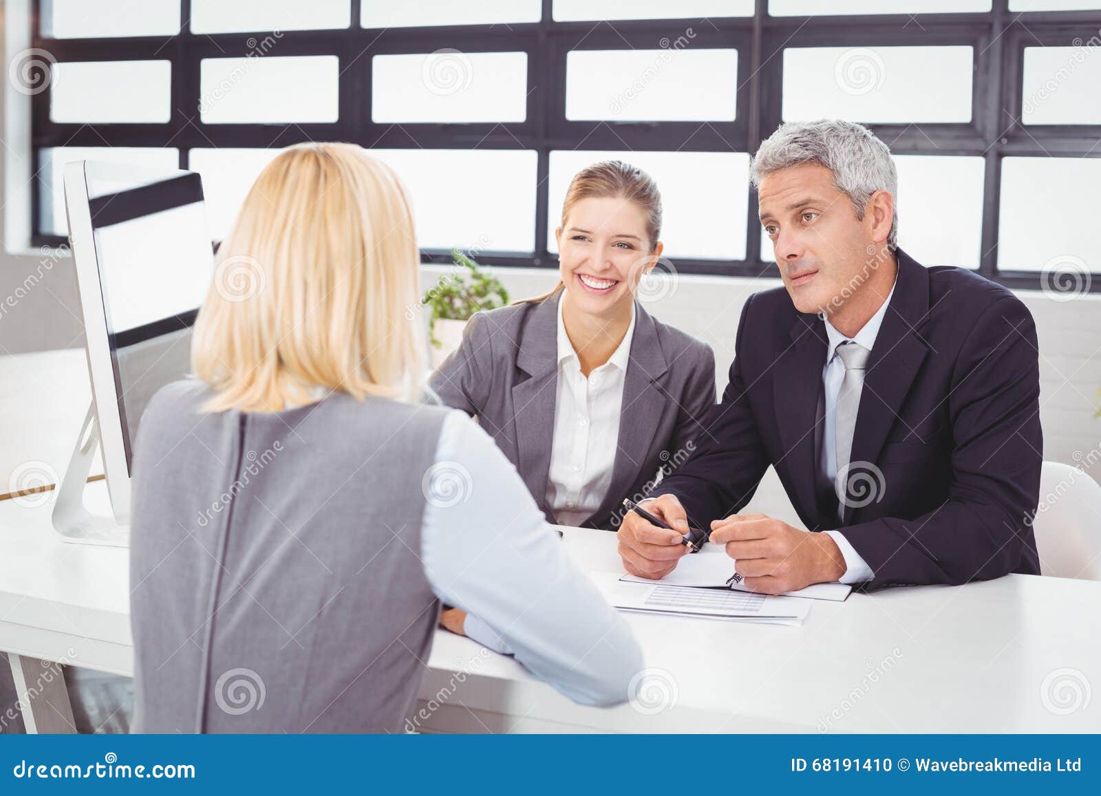 Bbusiness People Discussing with Client Stock Photo - Image of ...