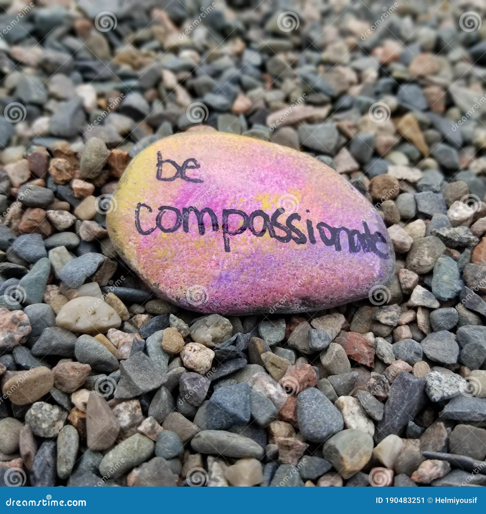 Be Compassionat Written on Stone Stock Image - Image of rocks, sand ...