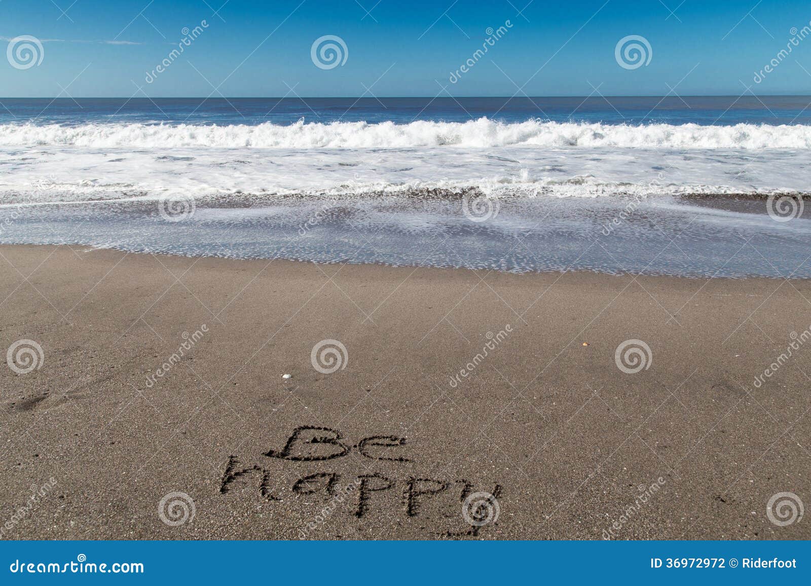 Be happy in sand stock photo. Image of symbol, single - 36972972