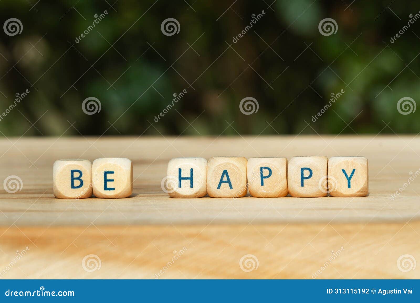 Be Happy Short Phrase Made with Wooden Letter Blocks on a Wooden Table ...