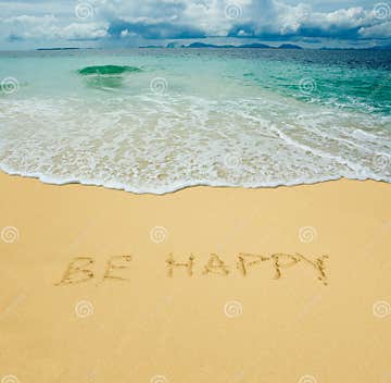 Be happy written in a sand stock image. Image of relax - 4780185
