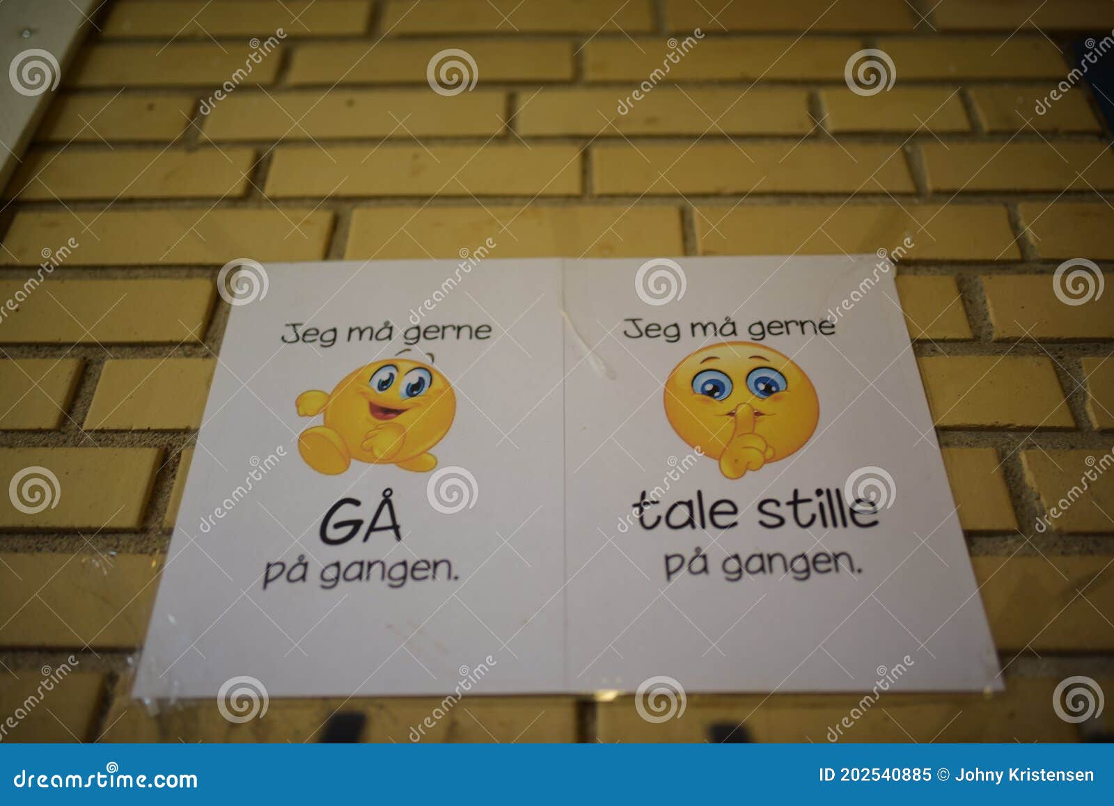 A Be Quite Sign Hanging on a Wall Stock Image - Image of middle ...