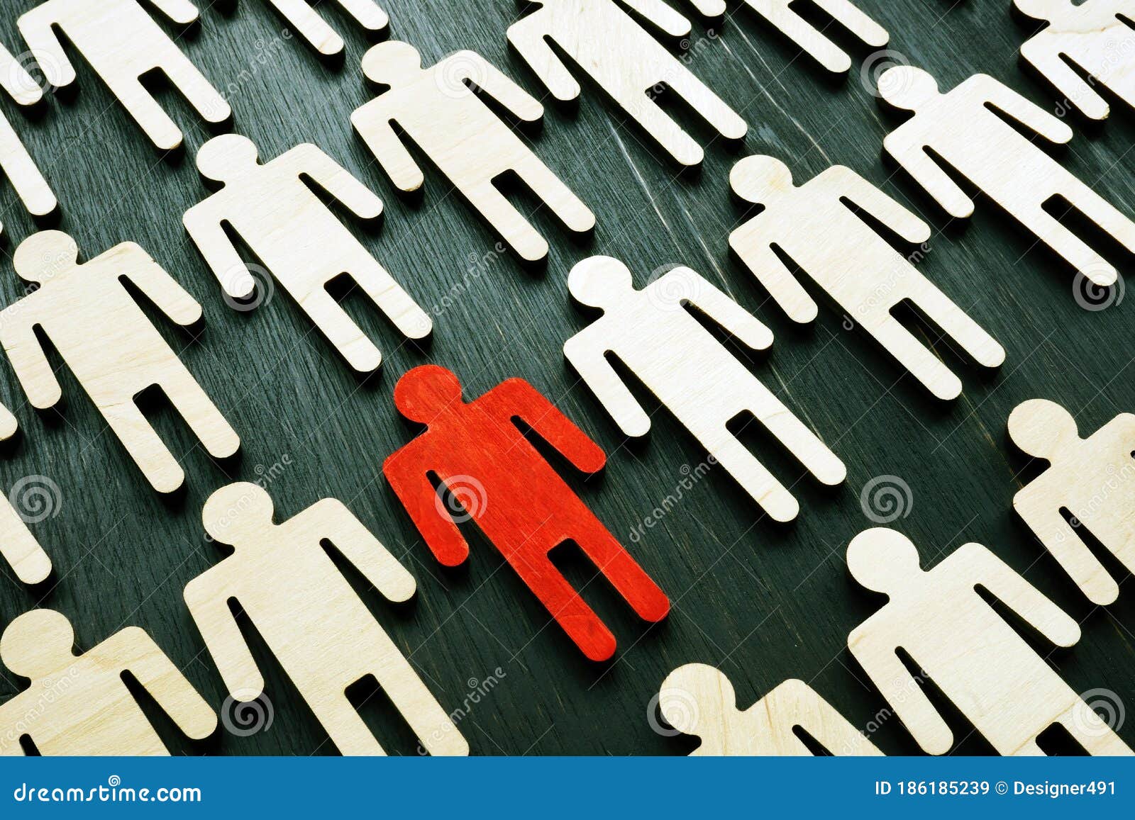 Be Unique and Different. Crowd from Wooden Figures and Red One ... Be Unique and Different. Crowd from Wooden Figures and Red One ...
