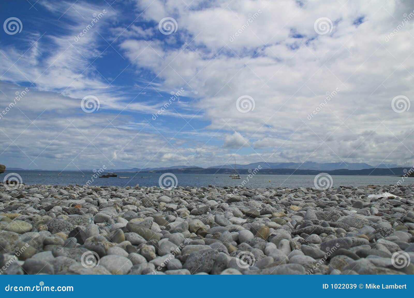 Beach stock image. Image of water, sunny, rock, seaside - 1022039