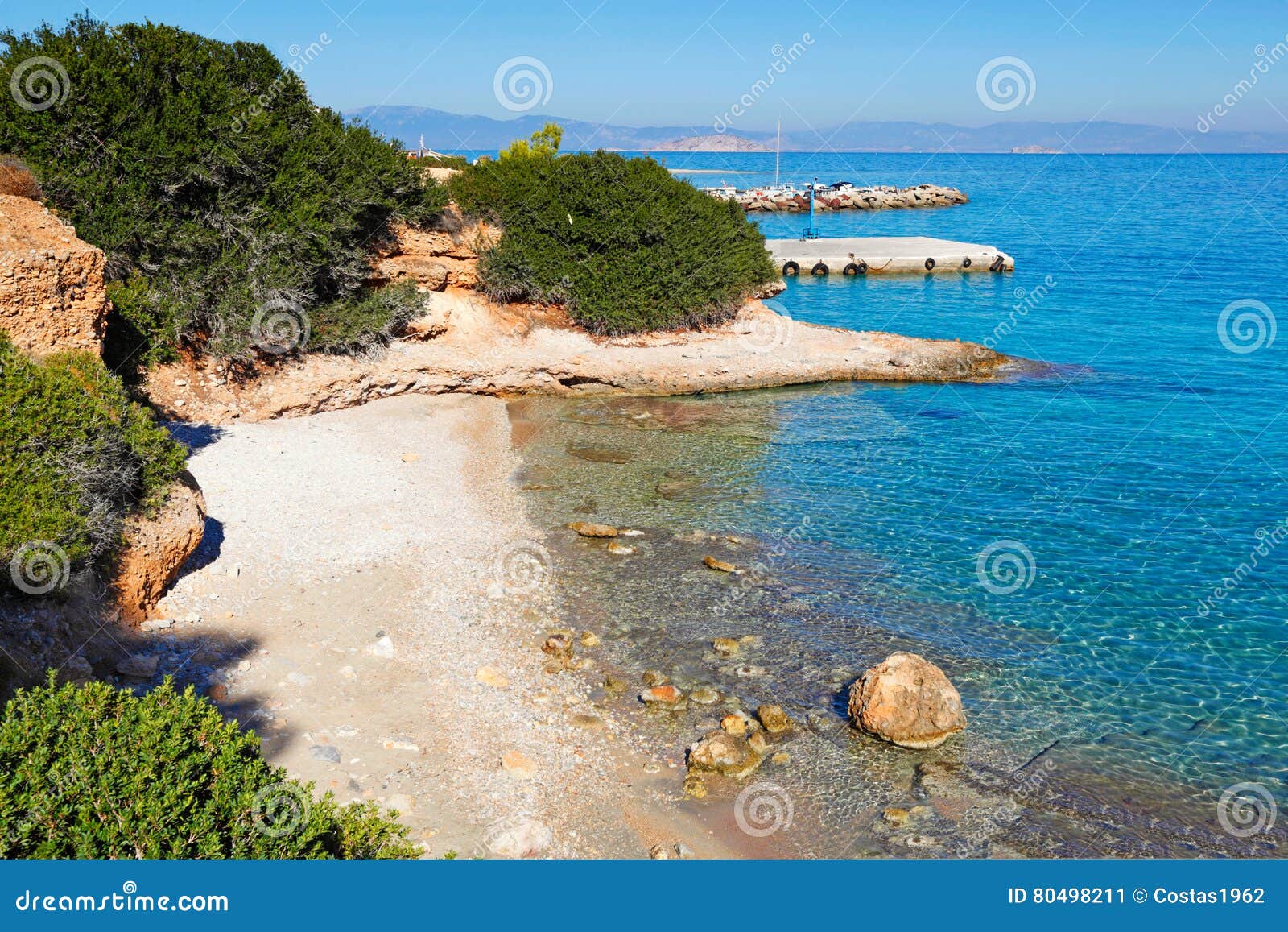 A beach in Agistri, Greece stock image. Image of aegean - 80498211