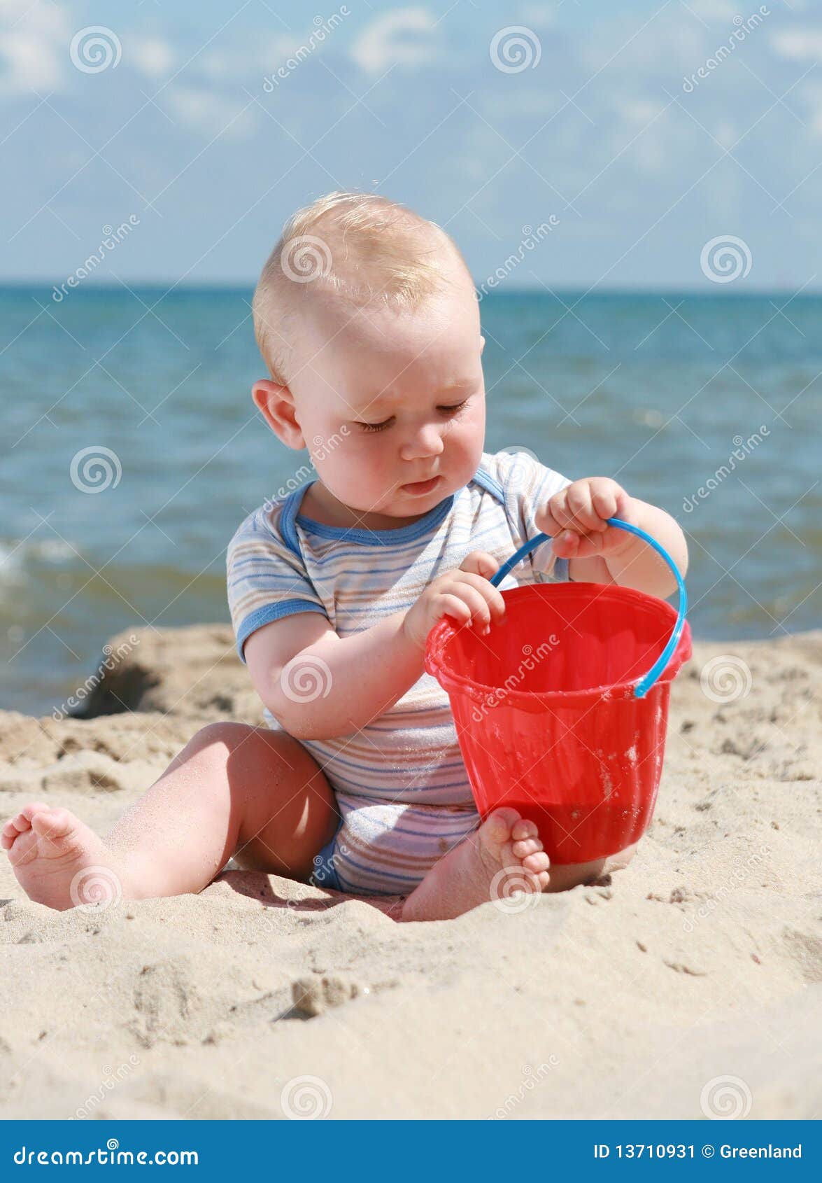 Beach baby stock image. Image of bucket, playing, colour - 13710931