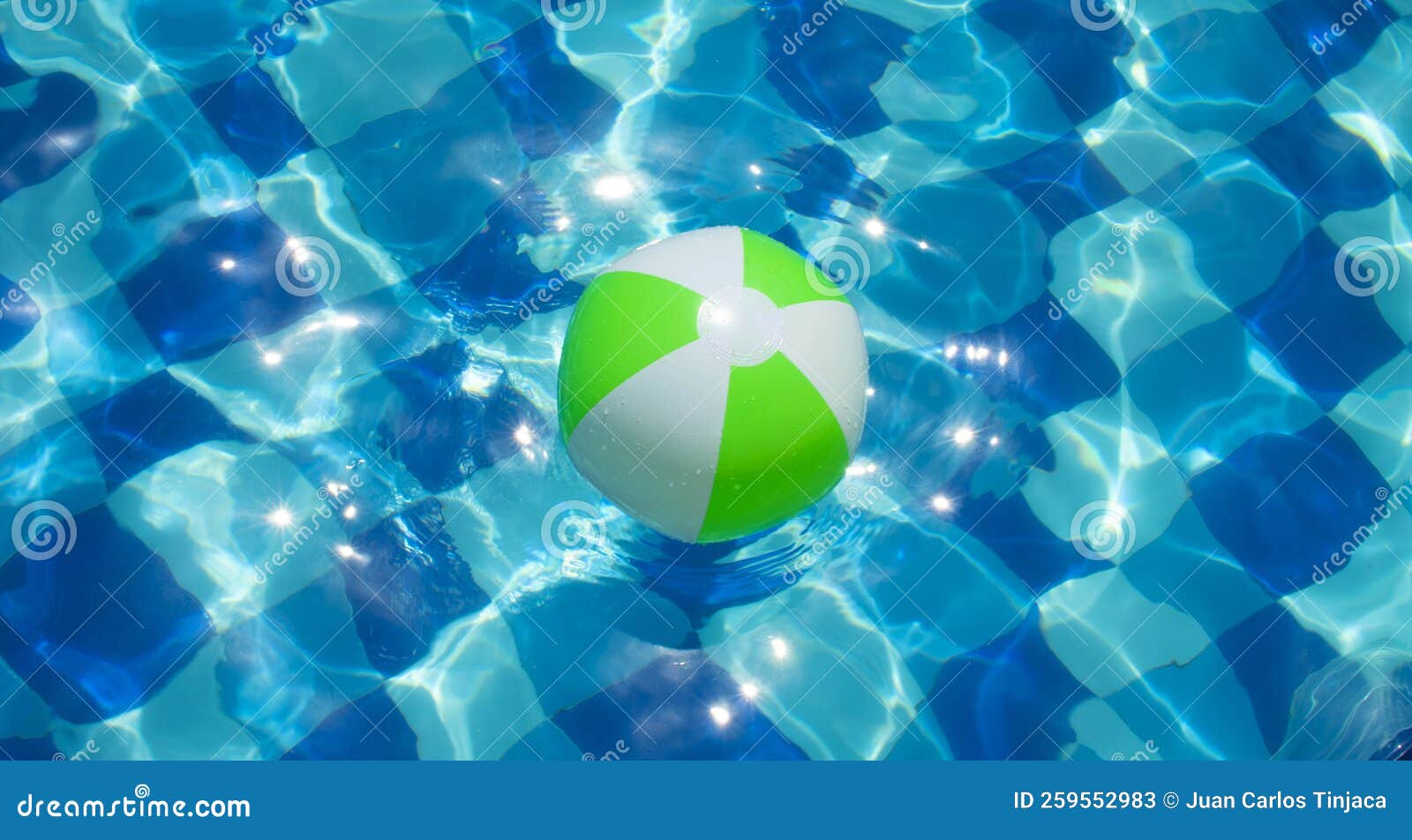 Beach ball floating stock image. Image of holidays, pool - 259552983