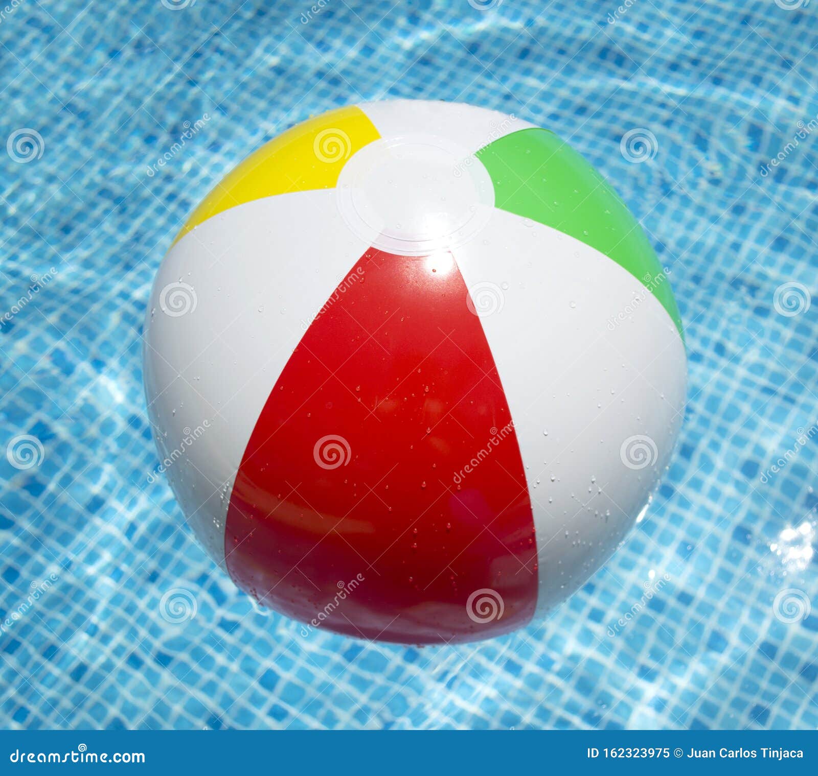 Beach Ball Floating in Swimming Pool Stock Image - Image of color ...
