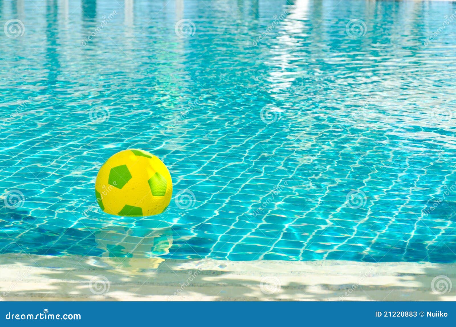 Beach Ball in Pool with Sun Reflection Stock Image - Image of color ...