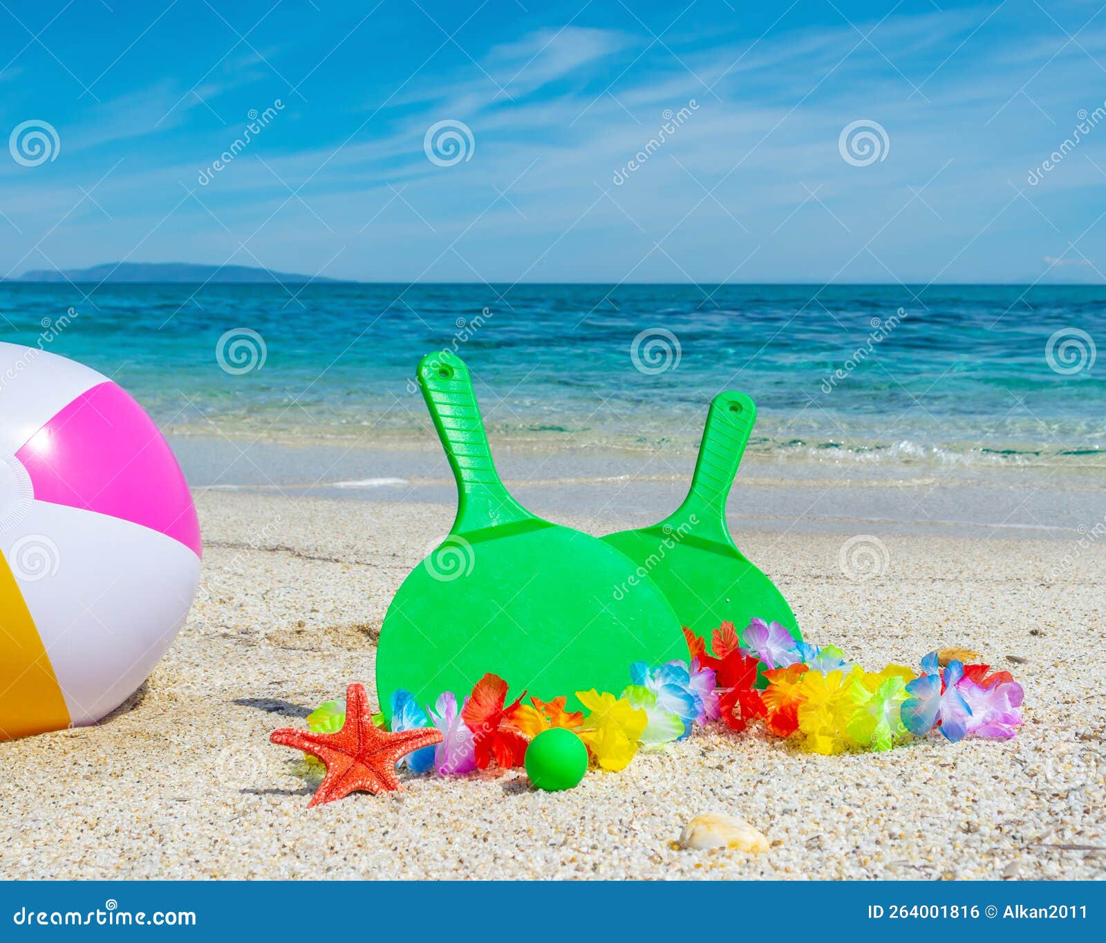 Beach Ball and Racket on the Sand by the Sea Stock Photo - Image of ...