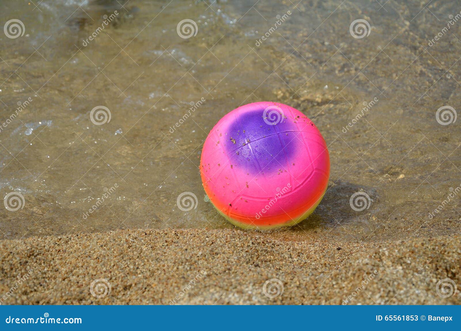Beach Ball in Shallow Sea Water Stock Image - Image of beach, game ...