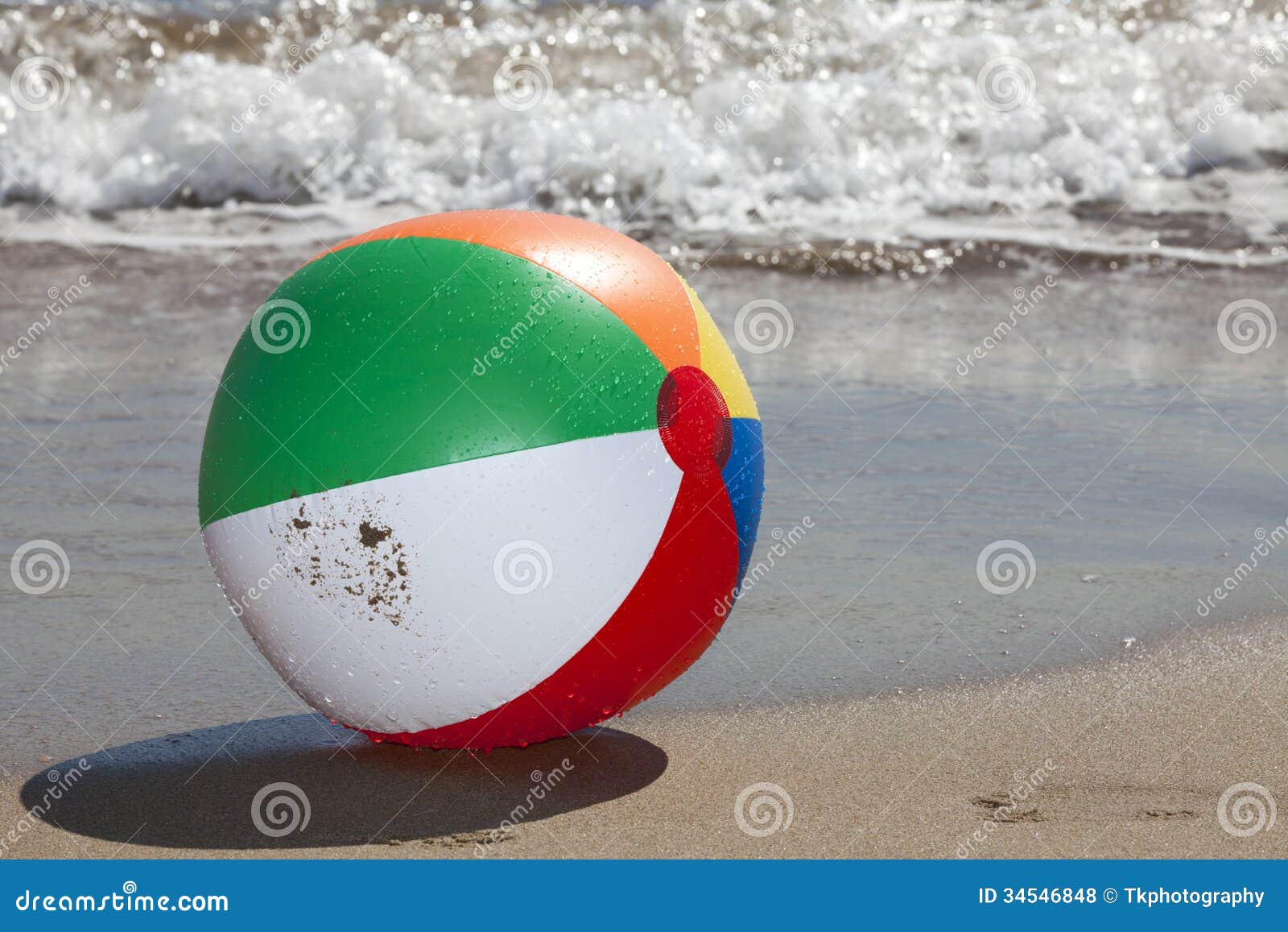 Beach Ball with Water Drops Stock Photo - Image of people, edge: 34546848