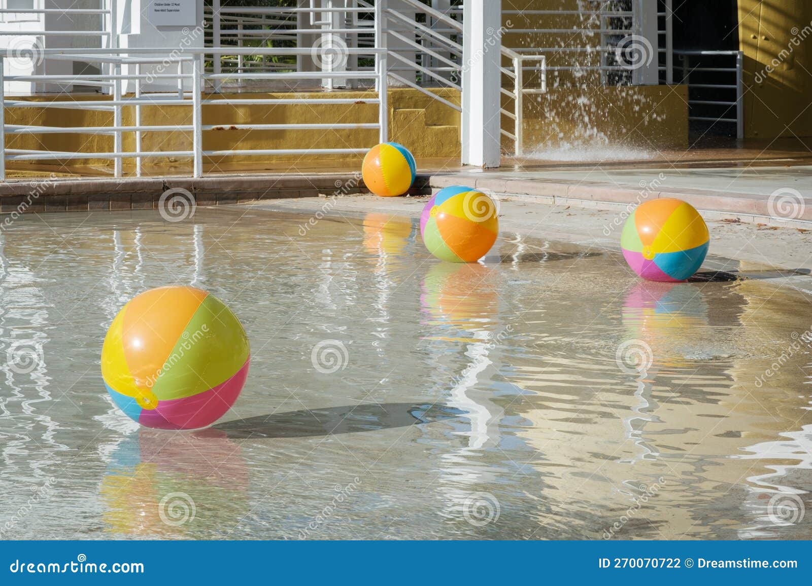 Beach Balls Float in the Water of a Resort Swimming Pool on a Summer ...