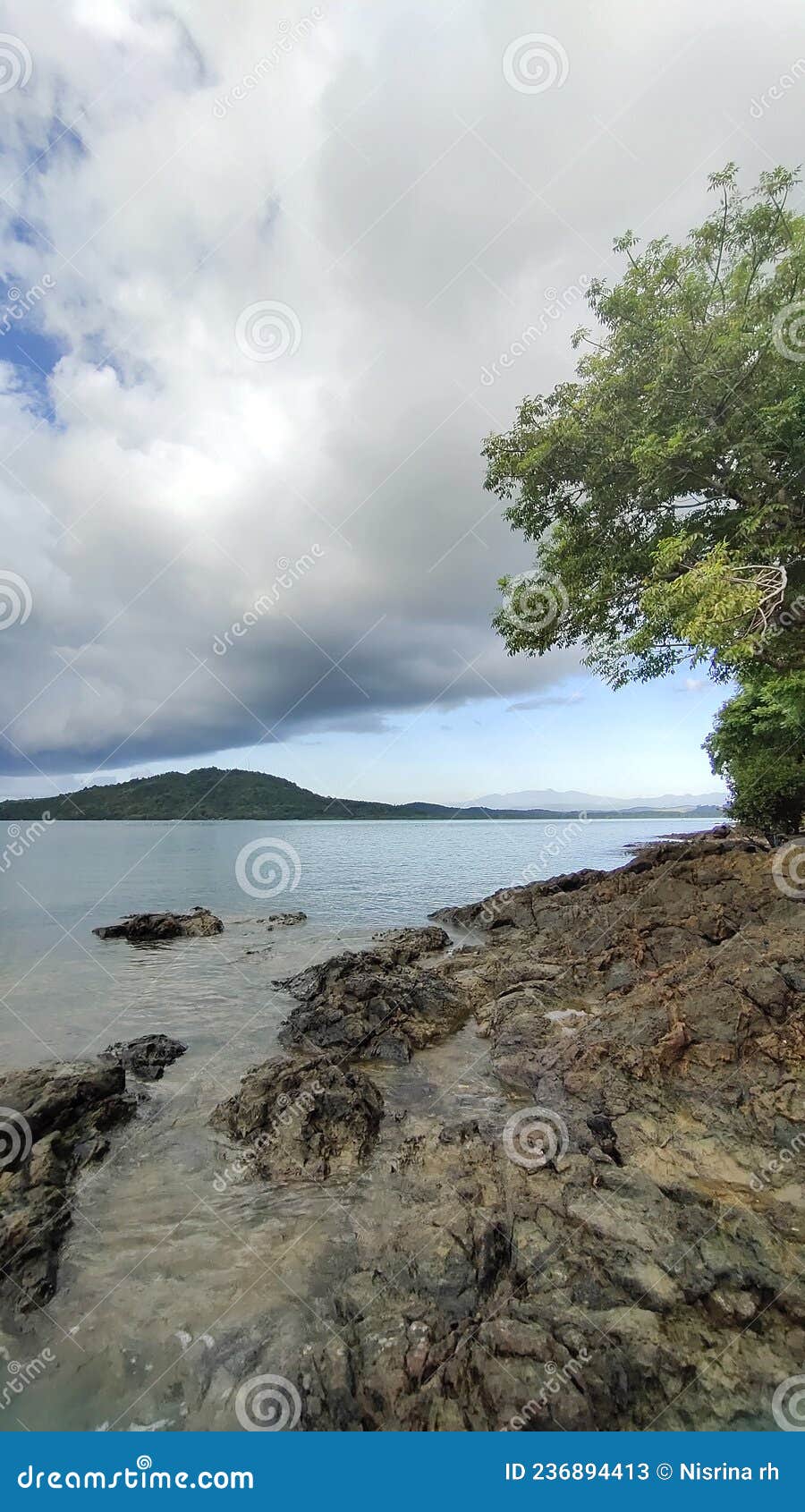 A beach without beach sand stock image. Image of cloud - 236894413