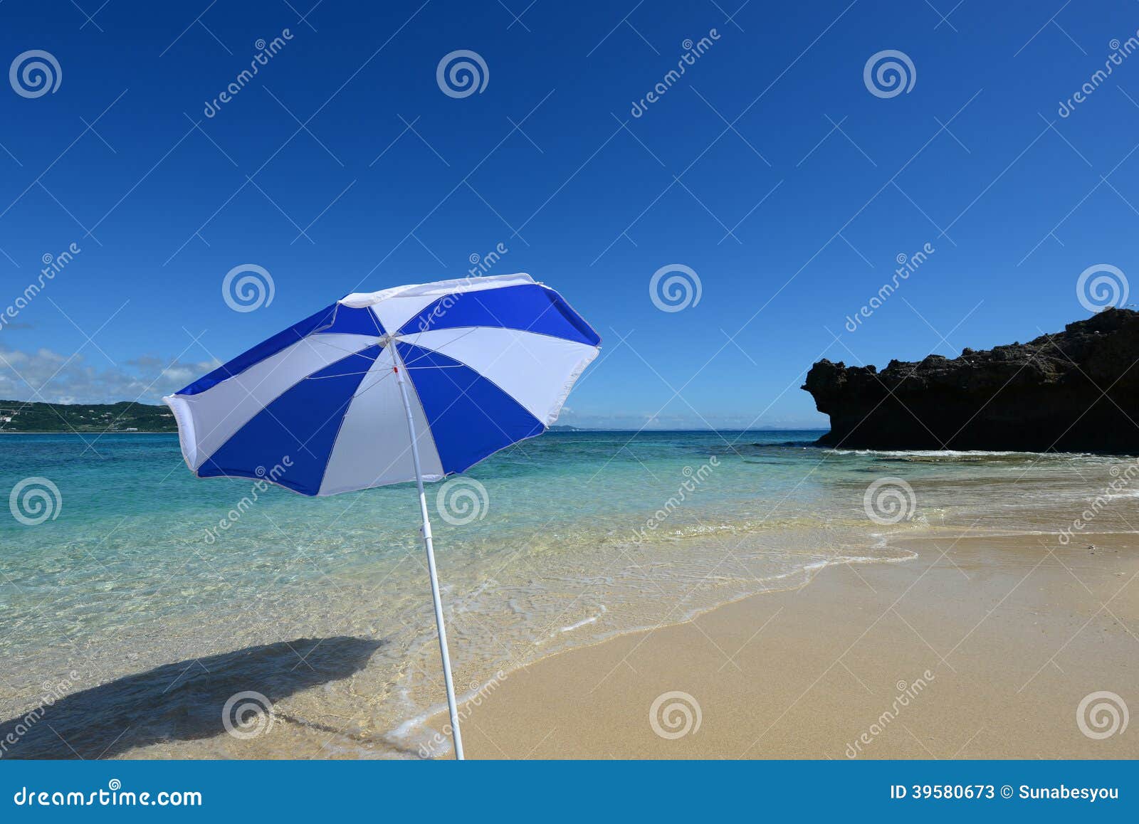 The Beach and the Beach Umbrella of Midsummer. Stock Image - Image of ...