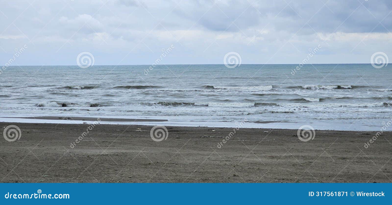 Beach with a Bench Facing the Ocean and Waves Stock Image - Image of ...