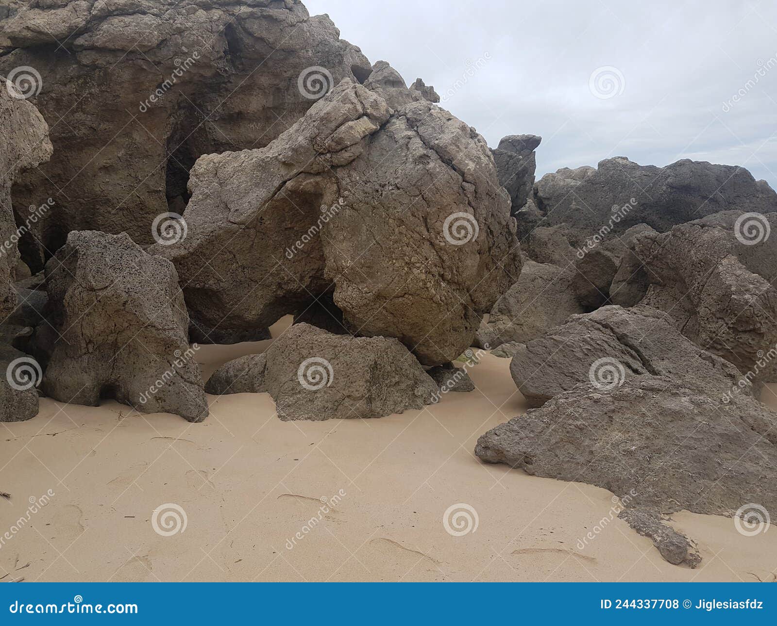 Beach with Big Rocks on the Sand Stock Photo - Image of hopeless ...