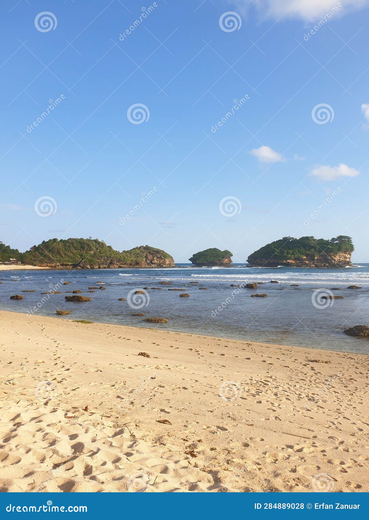 Pacitan beach stock photo. Image of sand, rocks, blue - 284889028