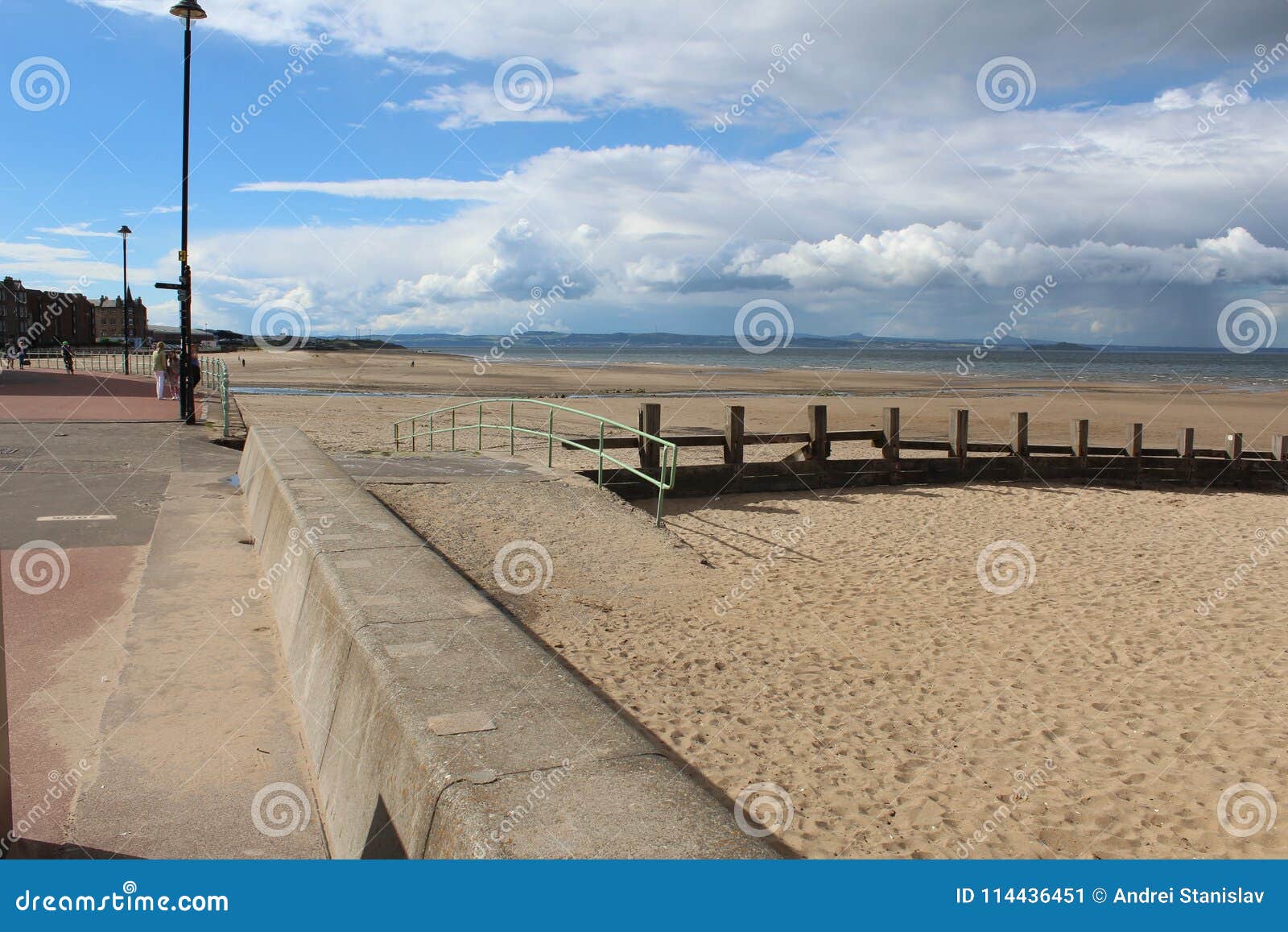 Sidewalk stock image. Image of clouds, seaside, beach - 114436451