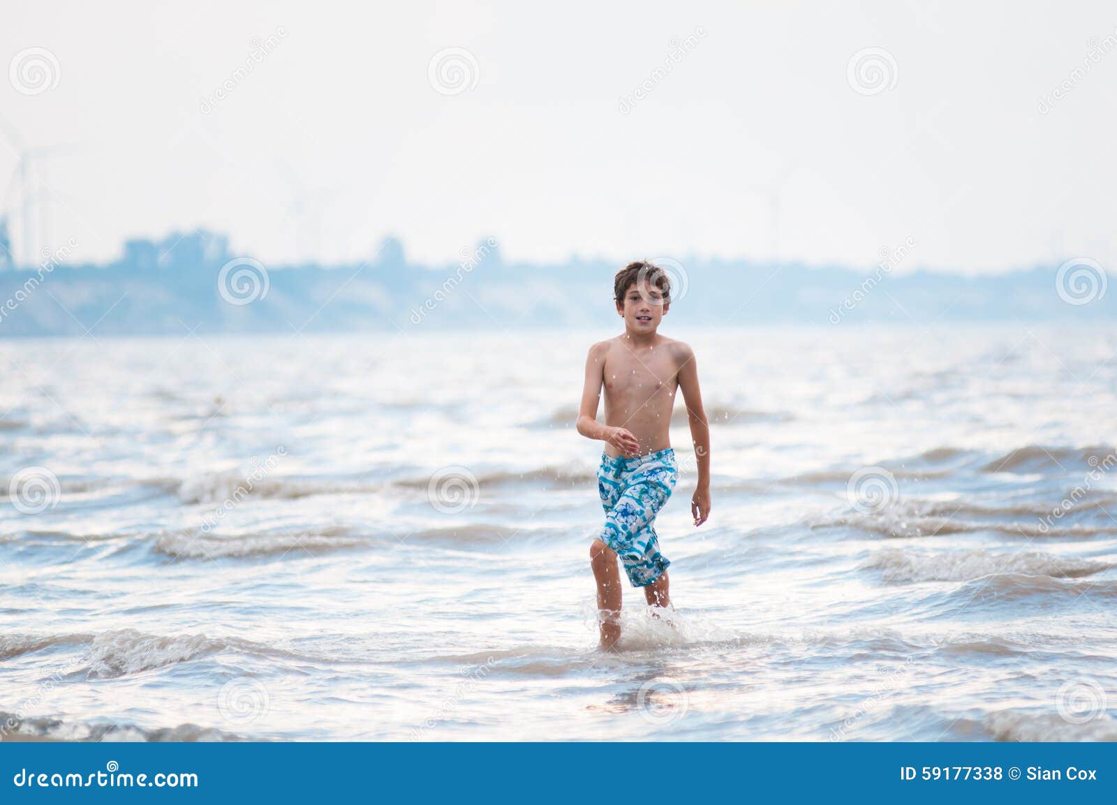 Beach boy stock photo. Image of water, enjoyment, erie - 59177338