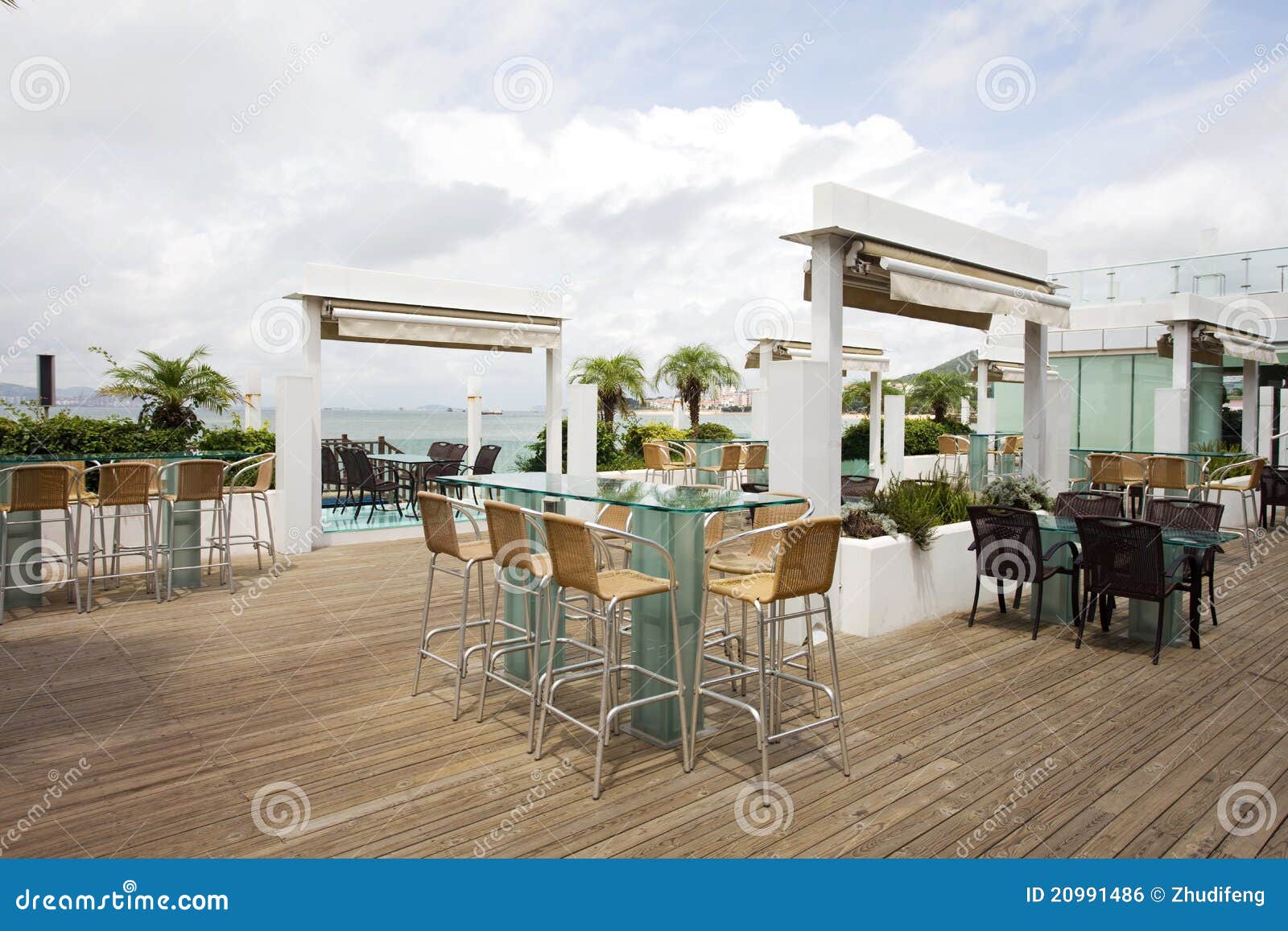 Beach Cafe with Tables and Chairs Stock Photo - Image of setting ...