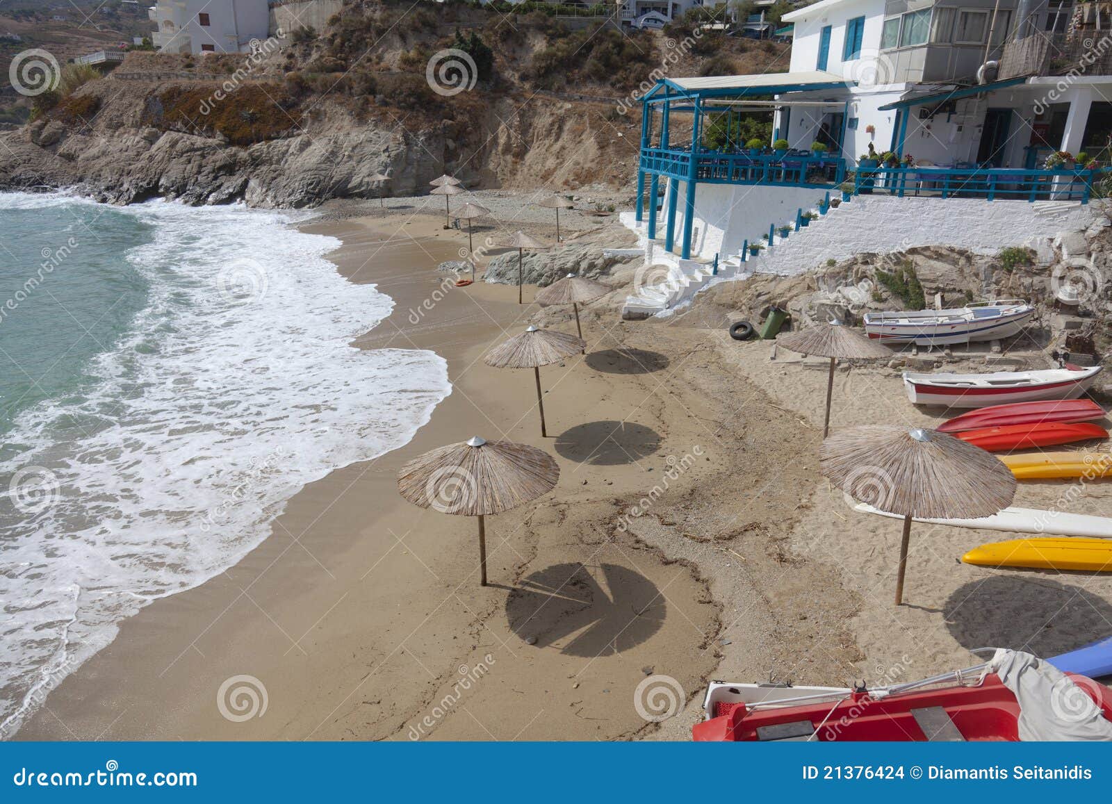 Beach with canoe in Greece stock photo. Image of outdoors - 21376424