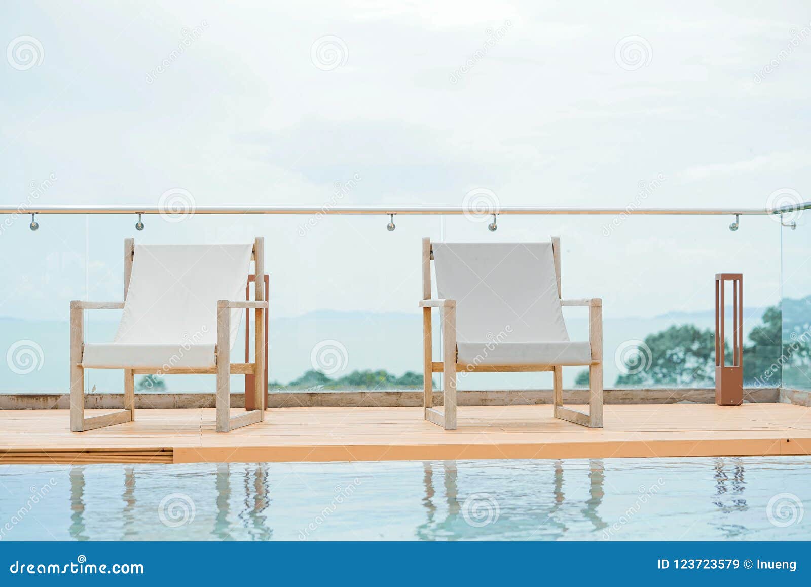 Beach Chair by the Pool on the Rooftop Hotel. Stock Image - Image of ...