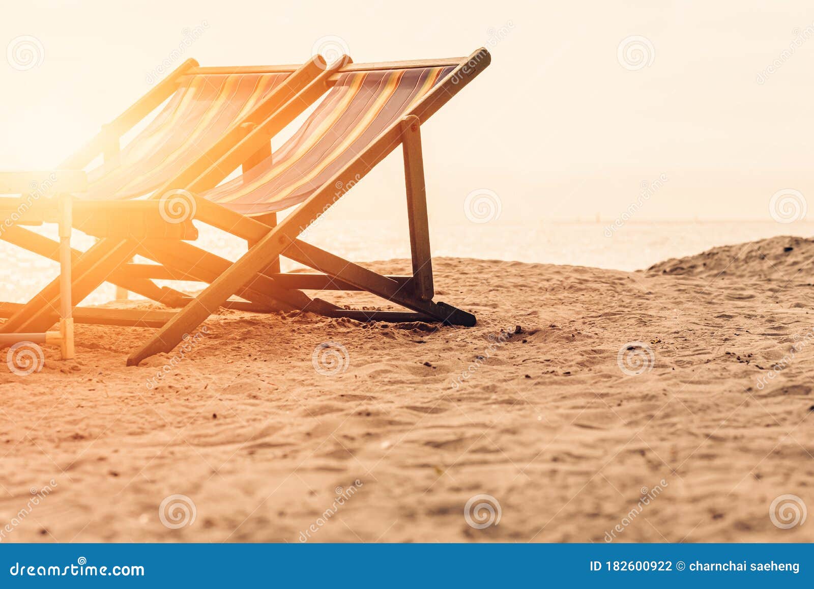 Beach Chair on the Beach with Sunset Stock Photo - Image of coastline ...