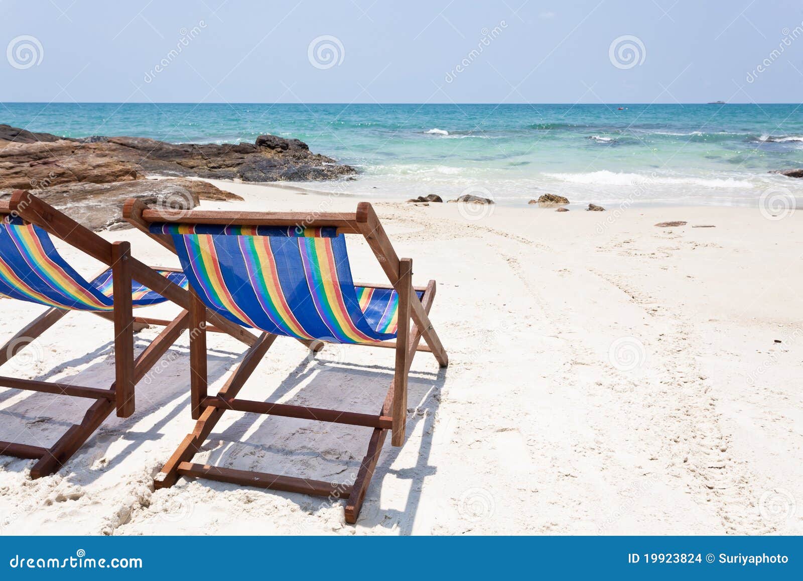 Beach chair on white sand stock photo. Image of sand - 19923824